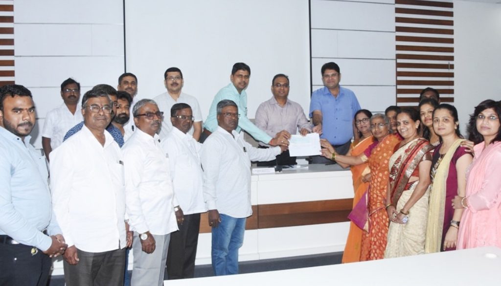 District Collector Distributes Cheques To 14 Farmers Whose Land Is ...